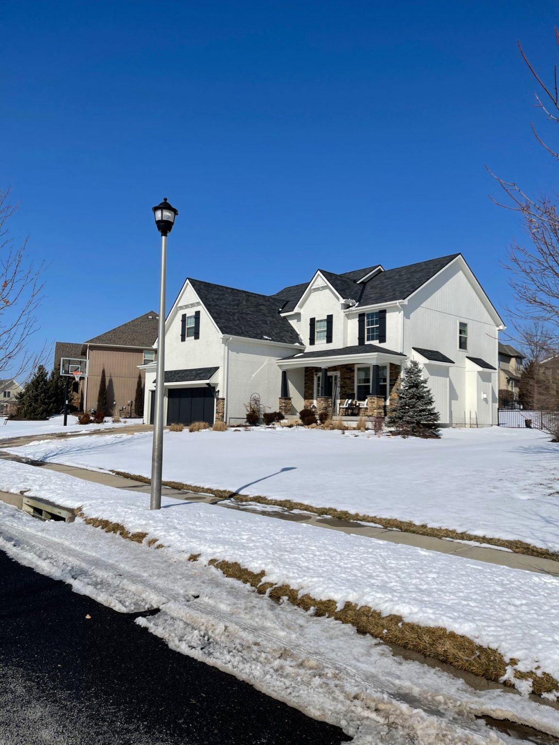 The Process of Getting a New Black Roof Installed - Life Love Larson